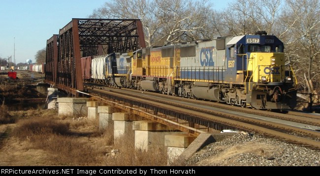 Picking up 29 cars at Manville yard , Q300 makes its way east